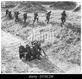 AN INFANTRY ASSAULT EXERCISE - A trench mortar section in action ...