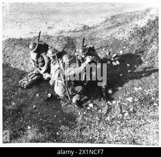 AN INFANTRY ASSAULT EXERCISE - A trench mortar section in action ...
