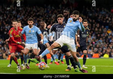 Real Madrid's Arda Guler, second left, vies for the ball with Girona's ...