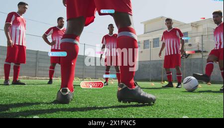 Group of friends wearing red soccer uniforms are training on field ...