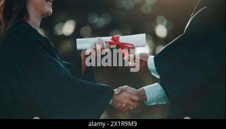 Giving, diploma and people handshake in graduation success ...