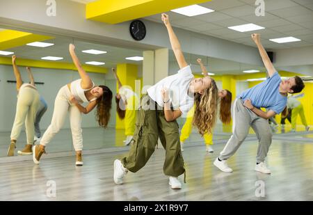 Dancer boys and girls showing different tricks and movements while ...