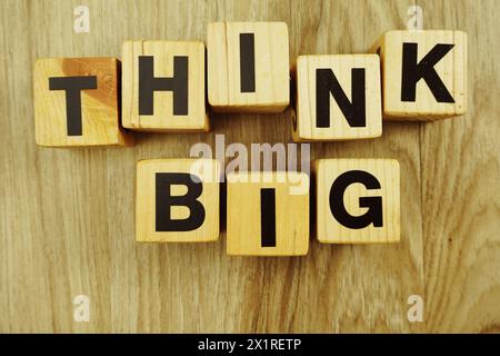 think big word made from wooden cubes with letters alphabet Stock Photo ...