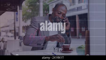 African American healthcare worker talking on phone and organizing ...