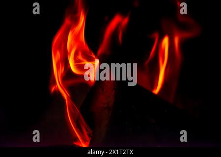 Capture the essence of inferno with a close-up of fiery wood fire ...
