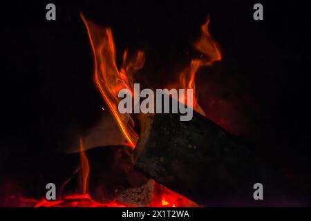 Capture the essence of inferno with a close-up of fiery wood fire ...