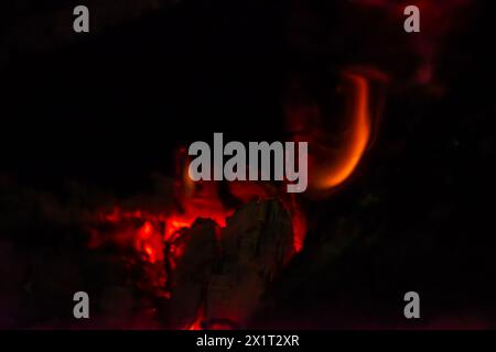 Capture the essence of inferno with a close-up of fiery wood fire ...