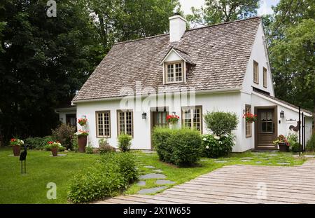 Old circa 1886 Canadiana cottage style home with white stucco cladding ...