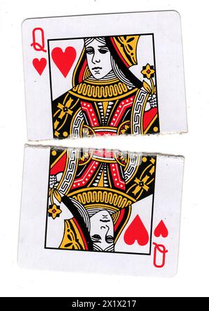 A torn half of a queen of hearts playing card on a white background ...