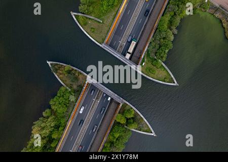 Highway with traffic passing underneath Veluwemeer aquaduct seen from ...