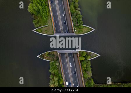 Highway with traffic passing underneath Veluwemeer aquaduct seen from ...