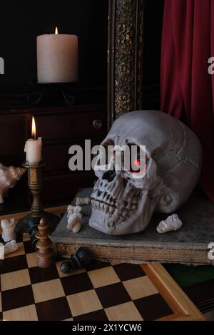 allegorical still life in the baroque genre Vanitas, a skull on a book ...