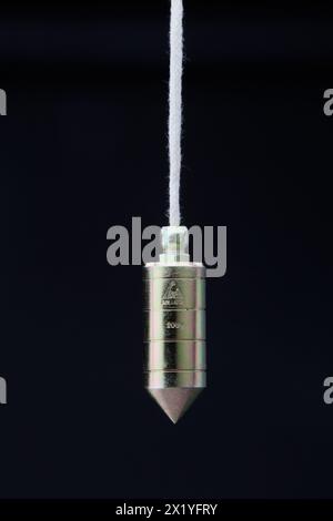 Plumb line, Building hand tool Stock Photo - Alamy