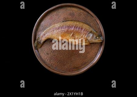 Delicious river trout fried in onion and lemon. Baked rainbow trout ...