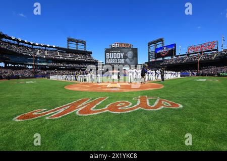 Milwaukee Brewers players stand for the national anthem before a ...