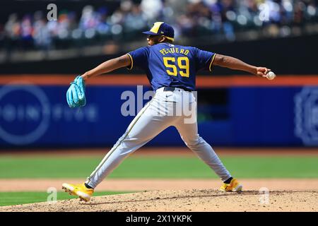 Milwaukee Brewers relief pitcher Elvis Peguero throws in the bullpen ...