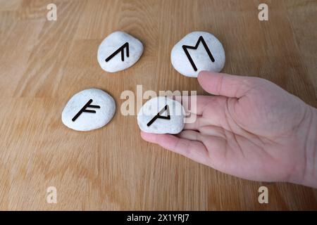 fortuneteller's hand explains the meaning of magical stone for fortune ...