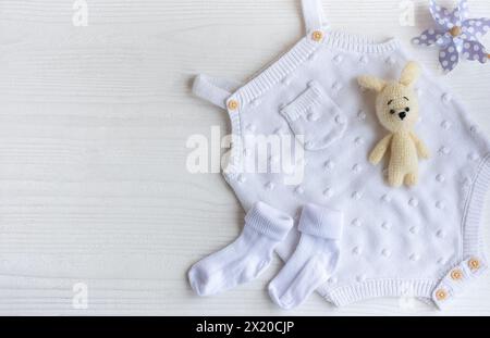 Baby clothes and accessories on wooden background Stock Photo - Alamy