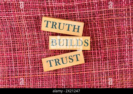 Truth builds trust symbol. Concept words Truth builds trust on red ...