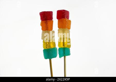Two mix colour jelly lollipop in black background Stock Photo - Alamy