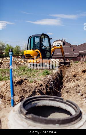 Digging trench for water pipes during house construction. Trench for ...