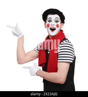 Funny mime artist pointing at something on white background Stock Photo ...