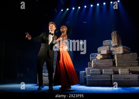 London, UK. Two Strangers (carry a cake across New York) at the ...