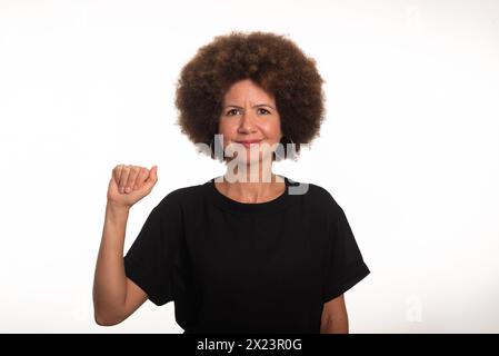 Interpreter of the Brazilian sign language, Libras, making the letter B ...