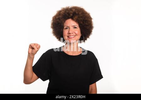 Female interpreter of the Brazilian sign language, Libras, making the ...