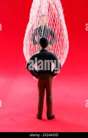 Man trapped in net Stock Photo - Alamy