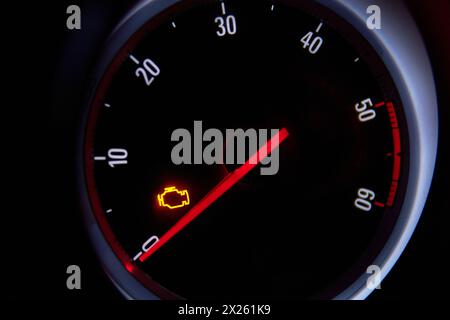 Check engine error light illuminated on car dashboard Stock Photo - Alamy