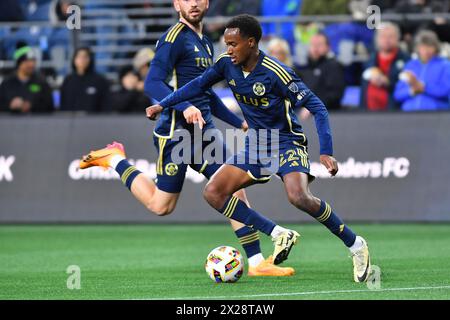 Vancouver Whitecaps forward Ali Ahmed (22) dribbles the ball past the ...