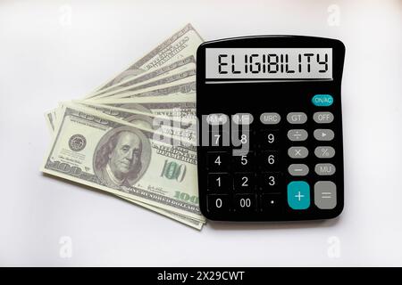 Business concept. Next to the calculator and dollars are cubes with the ...