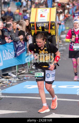 Laura Bird competing in the TCS London Marathon 2024 passing through ...