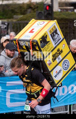 Laura Bird competing in the TCS London Marathon 2024 passing through ...
