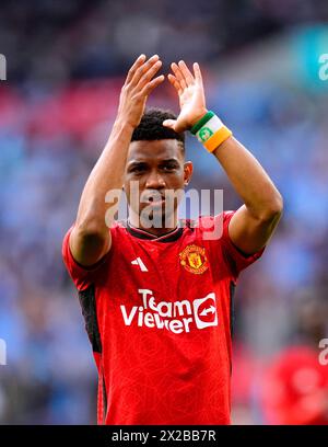 Manchester United's Amad Diallo applauds the fans following the UEFA ...