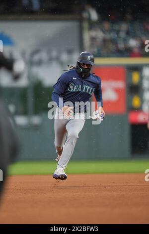 Seattle Mariners' J.P. Crawford runs up the first base line during a ...