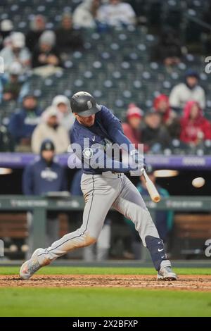 Seattle Mariners' Mitch Garver (18) slides into third base with a ...