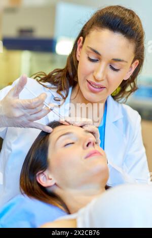 Syringe. Botox, cosmetic medicine. Botulinum toxin treatment involves ...