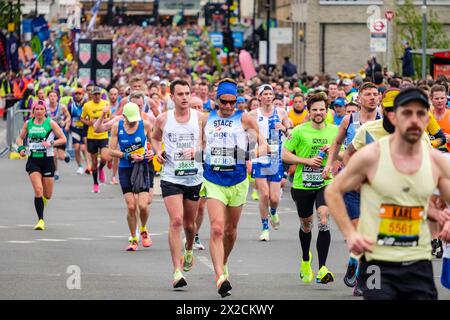 London Marathon 2024: The mass of runners makes its way through ...