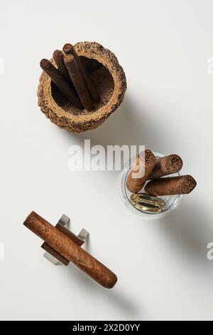 a cigar and match in a woodball Stock Photo - Alamy