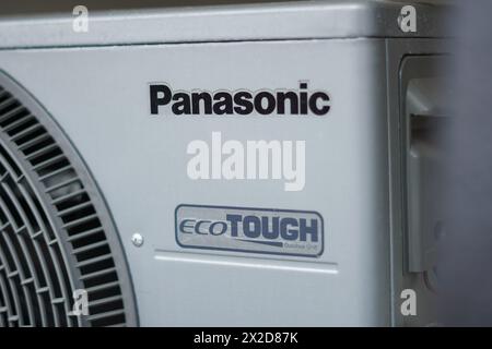 White Panasonic outdoor ac with eco touch feature Stock Photo - Alamy
