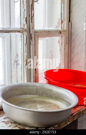 The Water tanks on the windowsill indoors Stock Photo - Alamy