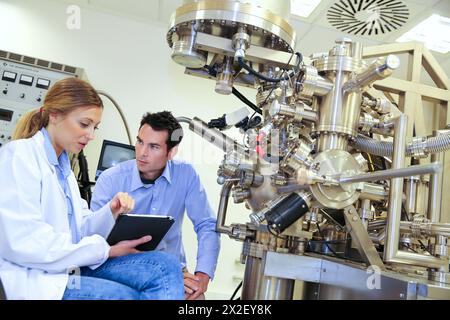 Researchers. Surface spectrometer, Photoelectron spectroscopy, Auger ...