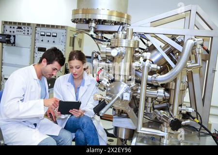 Researchers. Surface spectrometer, Photoelectron spectroscopy, Auger ...