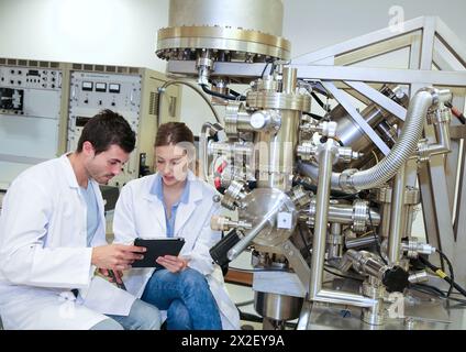 Researchers. Surface spectrometer, Photoelectron spectroscopy, Auger ...