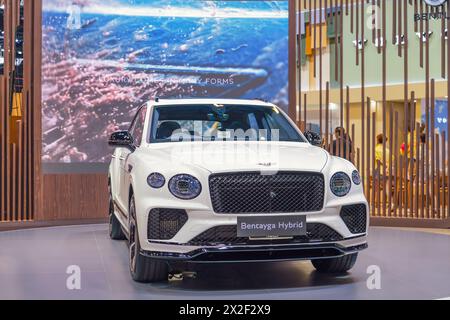 Luxurious white hybrid car Bentley Bentayga logo. Thailand, Bangkok 07 ...