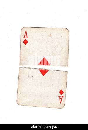 A torn half of a vintage, well used queen of spades playing card ...