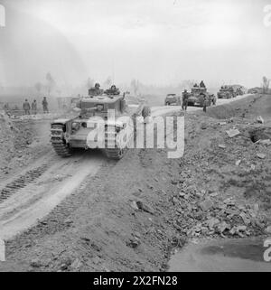 Churchill tanks of the British Army fire on enemy positions during ...