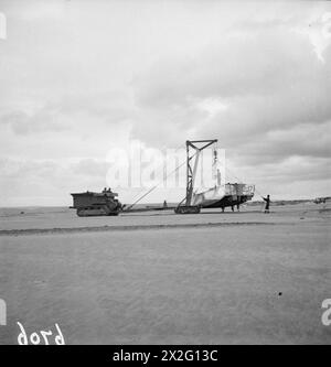AT HMS APPLEDORE, DEVON. JUNE 1945, ACTIVITIES OF THE NAVY'S LANDING ...